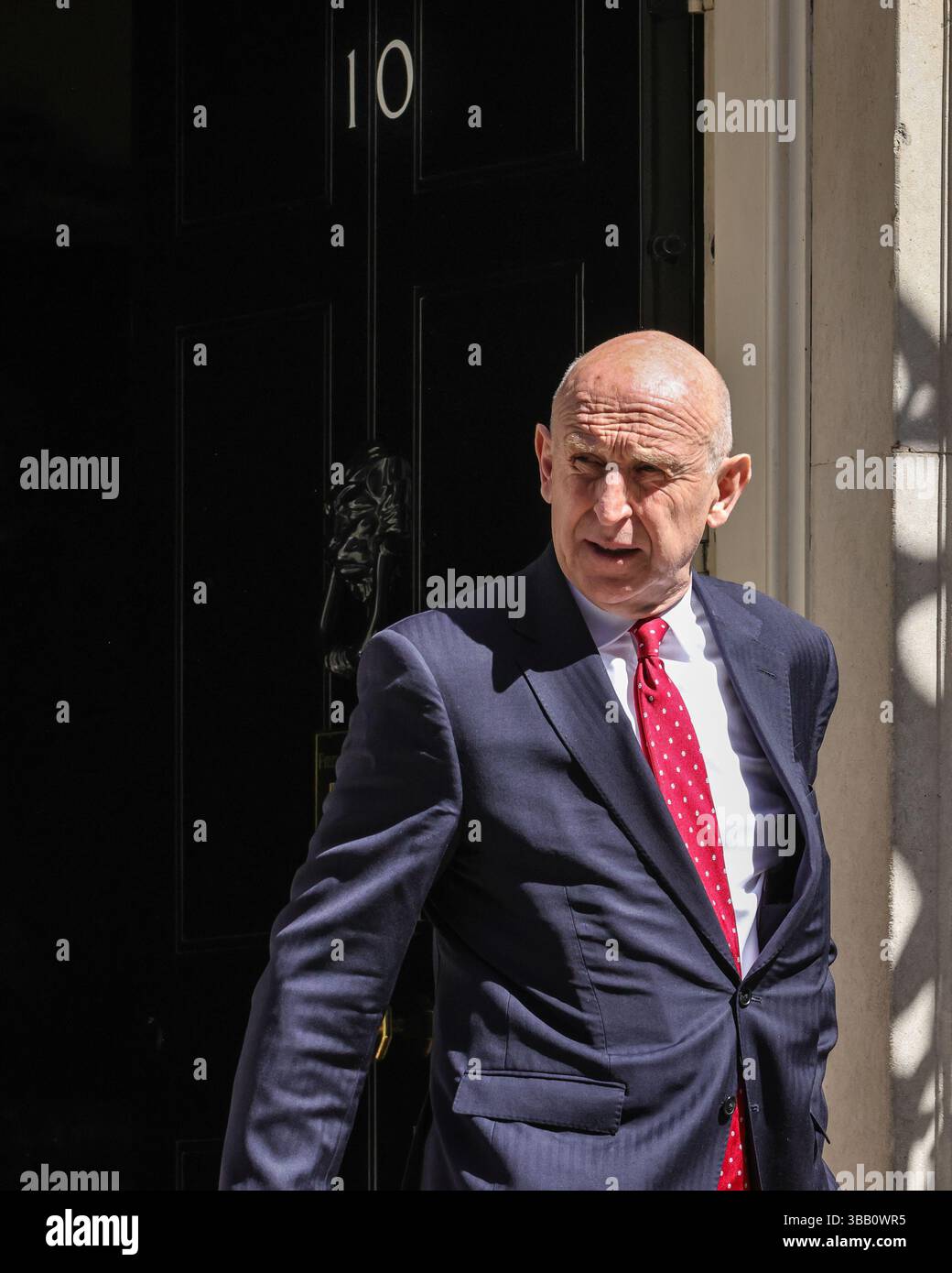 London, UK. 14th May, 2025. John Healey exits 10 Downing Street just ...