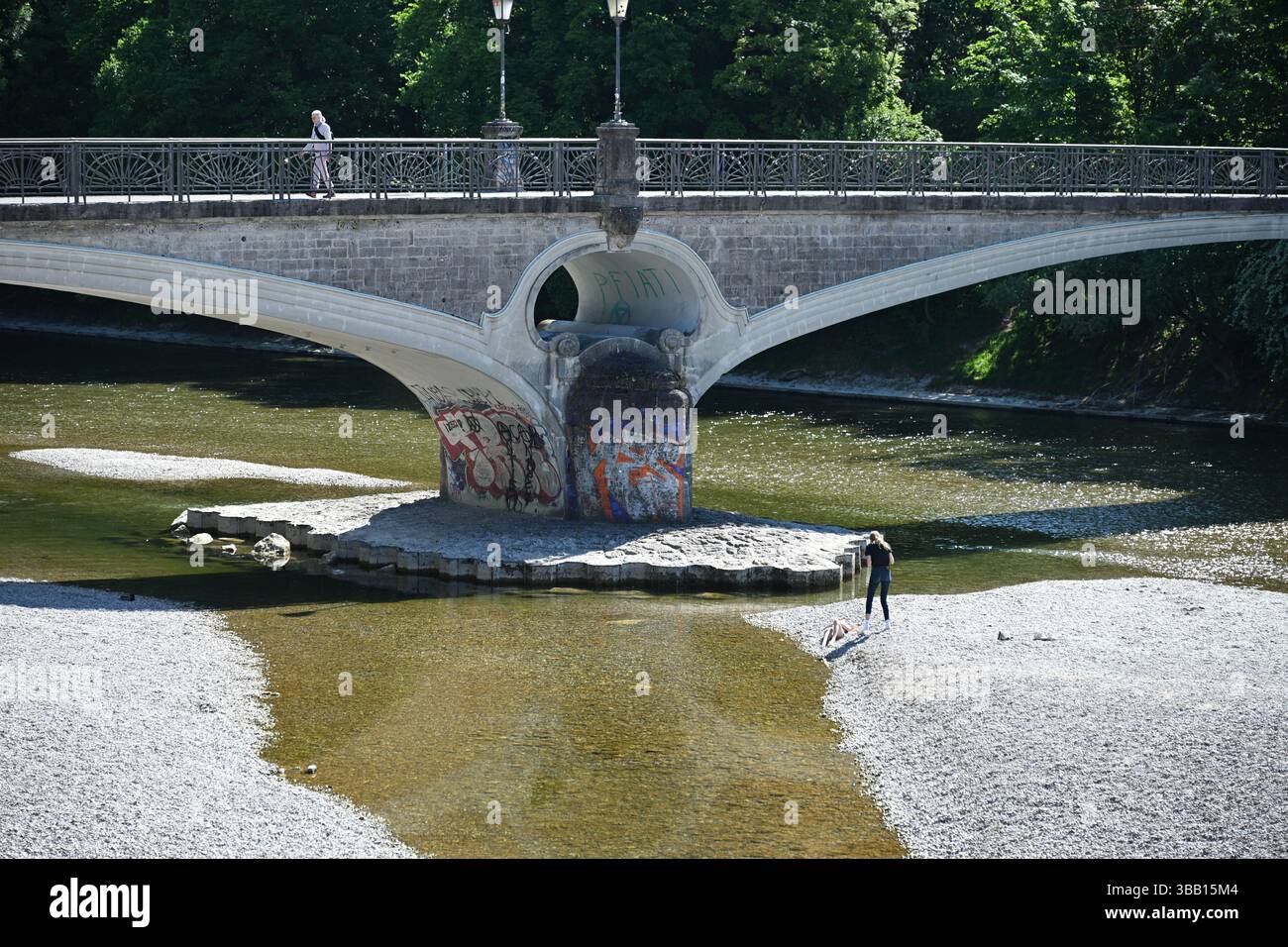 Munich, Deutschland. 13th May, 2025. Low water on the Isar River in ...