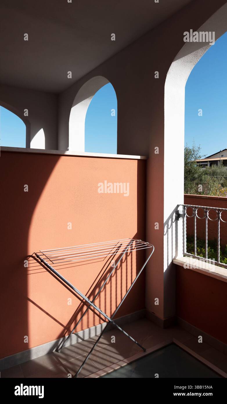 Clothes drying rack on the balcony Stock Photo - Alamy