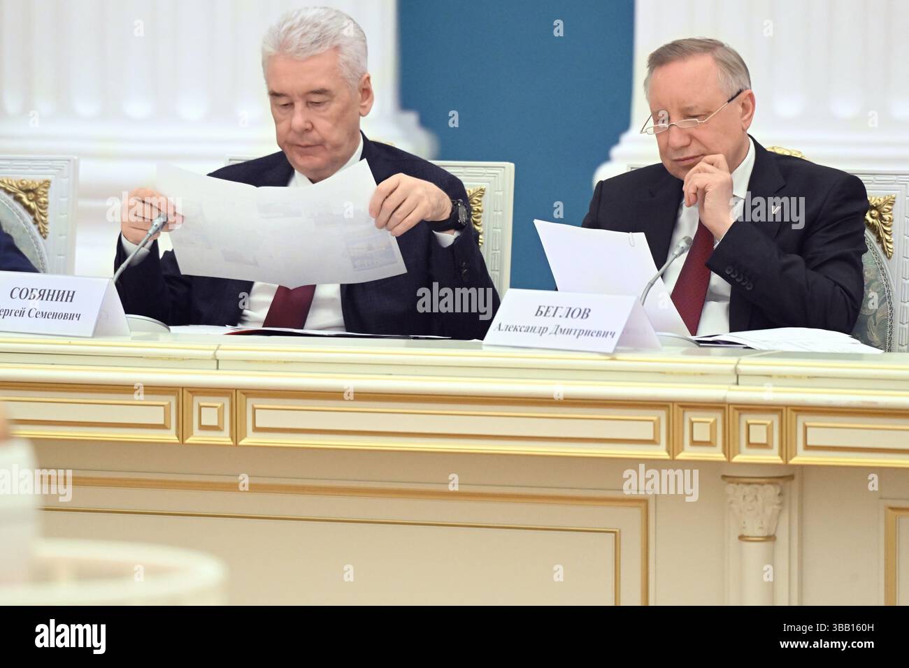 Moscow, Russia. 13th May, 2025. Moscow Mayor Sergei Sobyanin (left) and ...