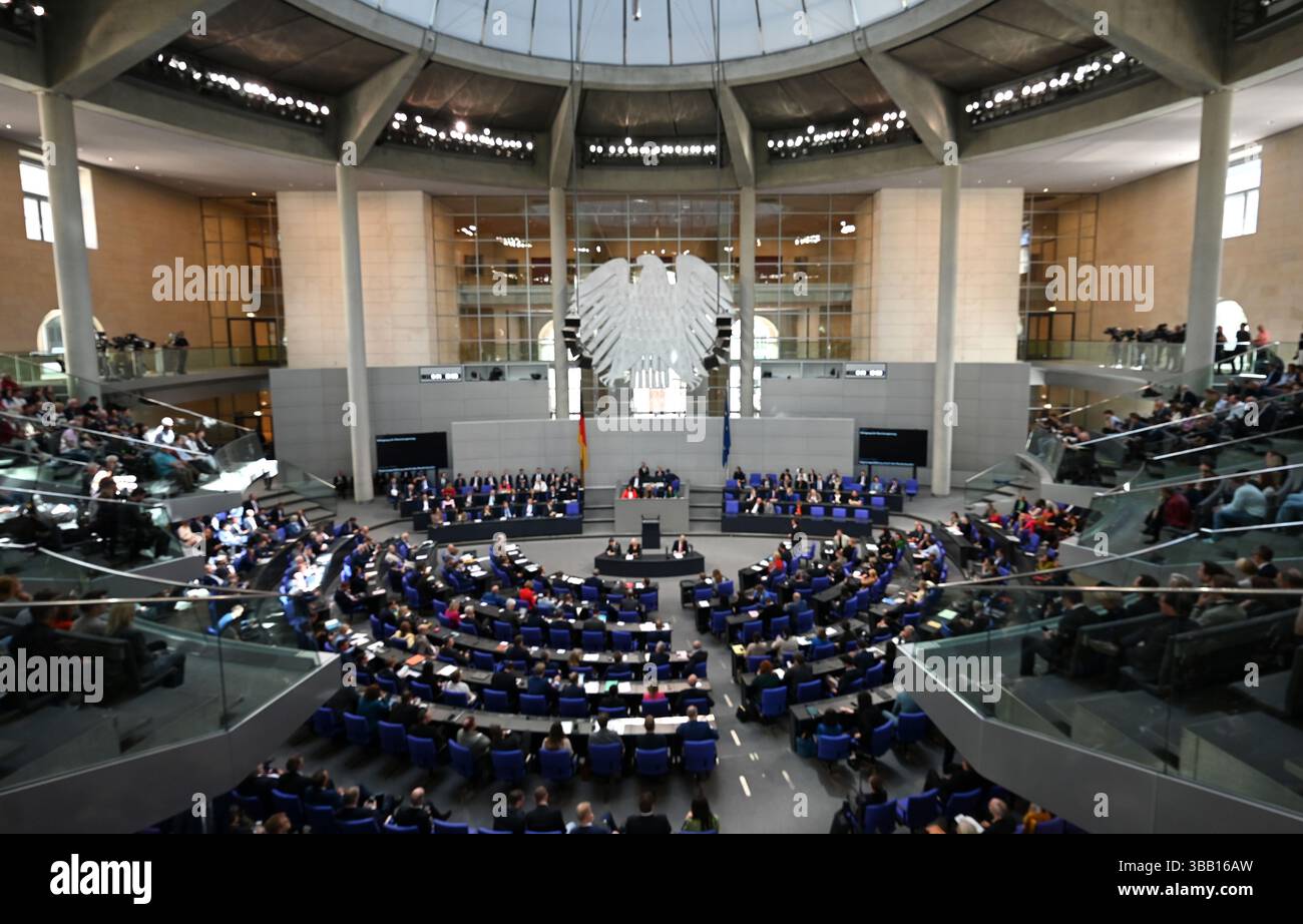 Berlin, Germany. 14th May, 2025. Members of parliament sit in the ...