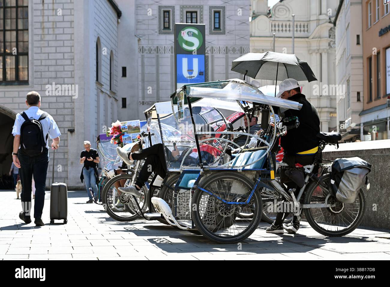 Munich, Deutschland. 13th May, 2025. Rickshaw drivers on Marienplatz in ...