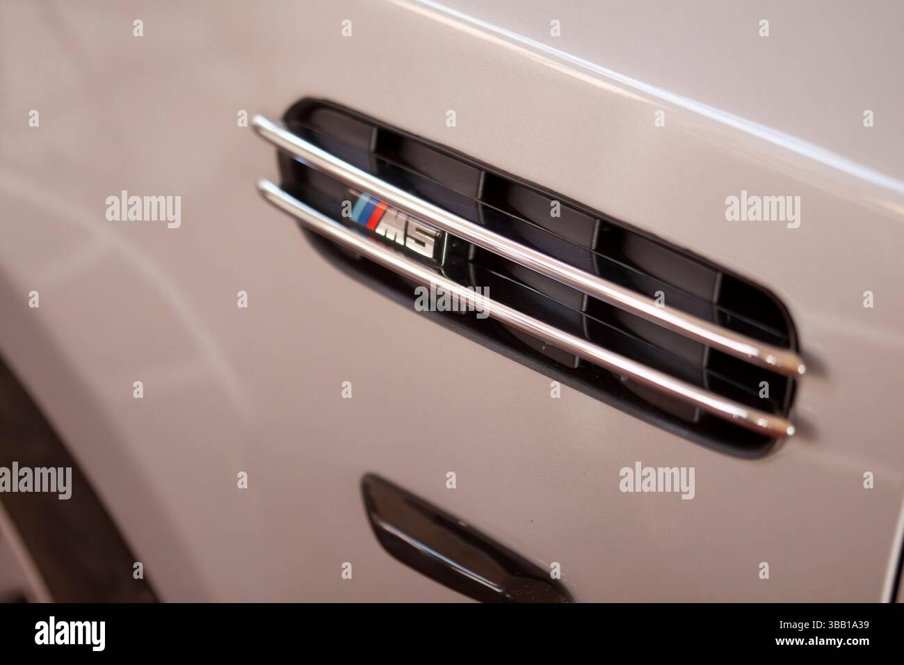 Rome, italy 10 may 2025: close-up of the iconic bmw m5 logo, signifying ...