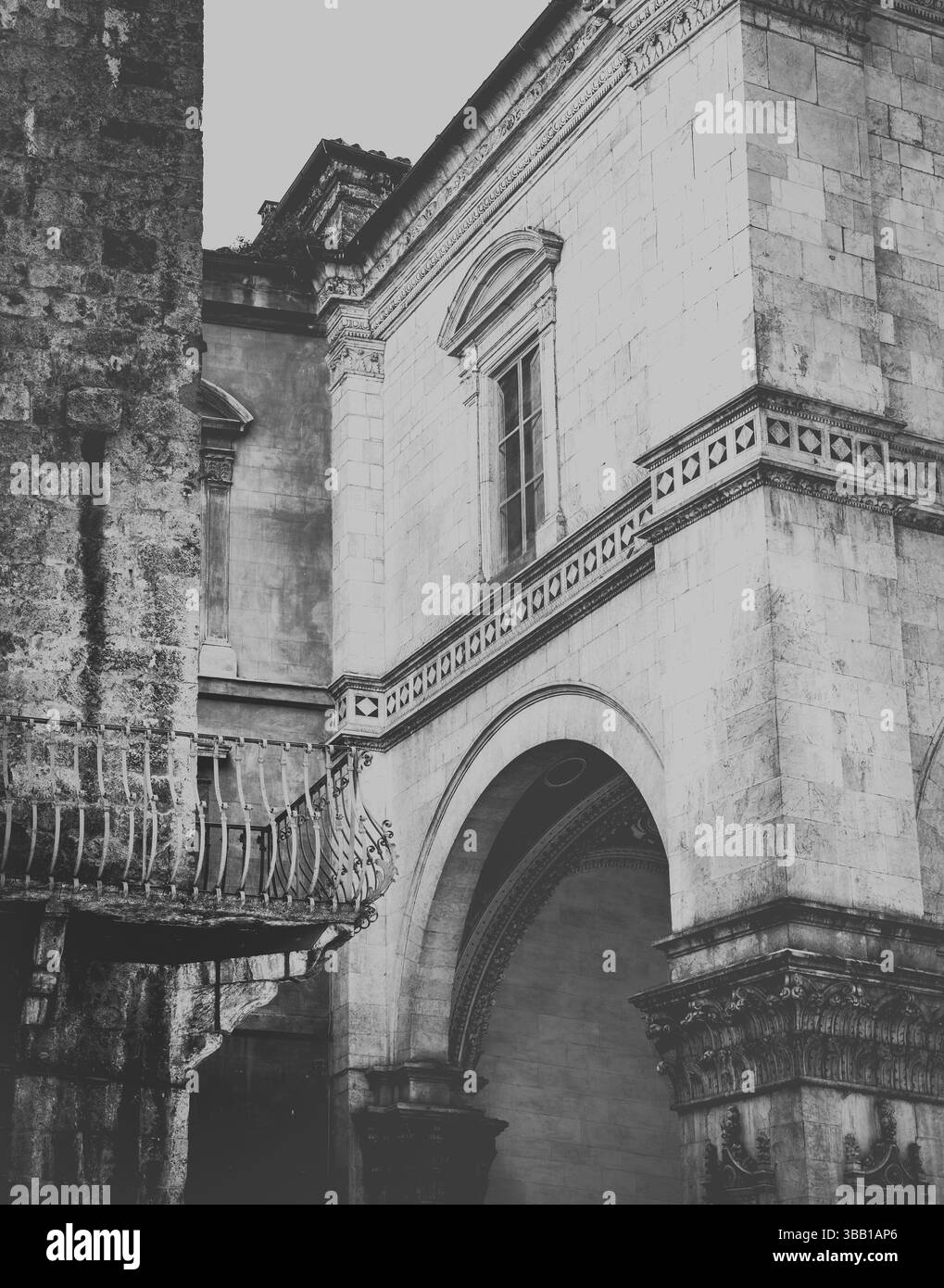 Balcony on one of the buildings around the medieval back streets of ...