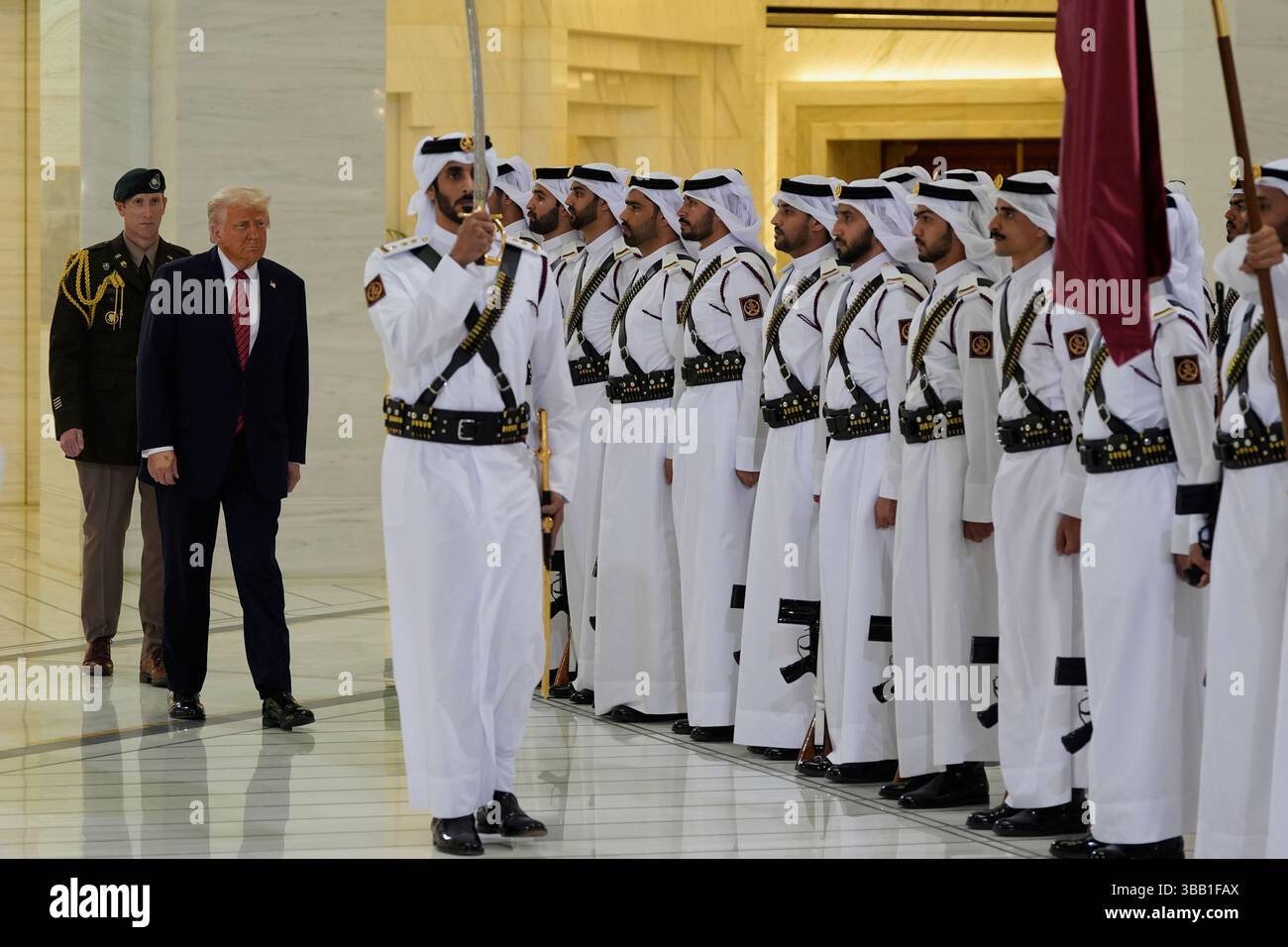 President Donald Trump reviews Qatari honor guard during an official welcoming ceremony at the ...