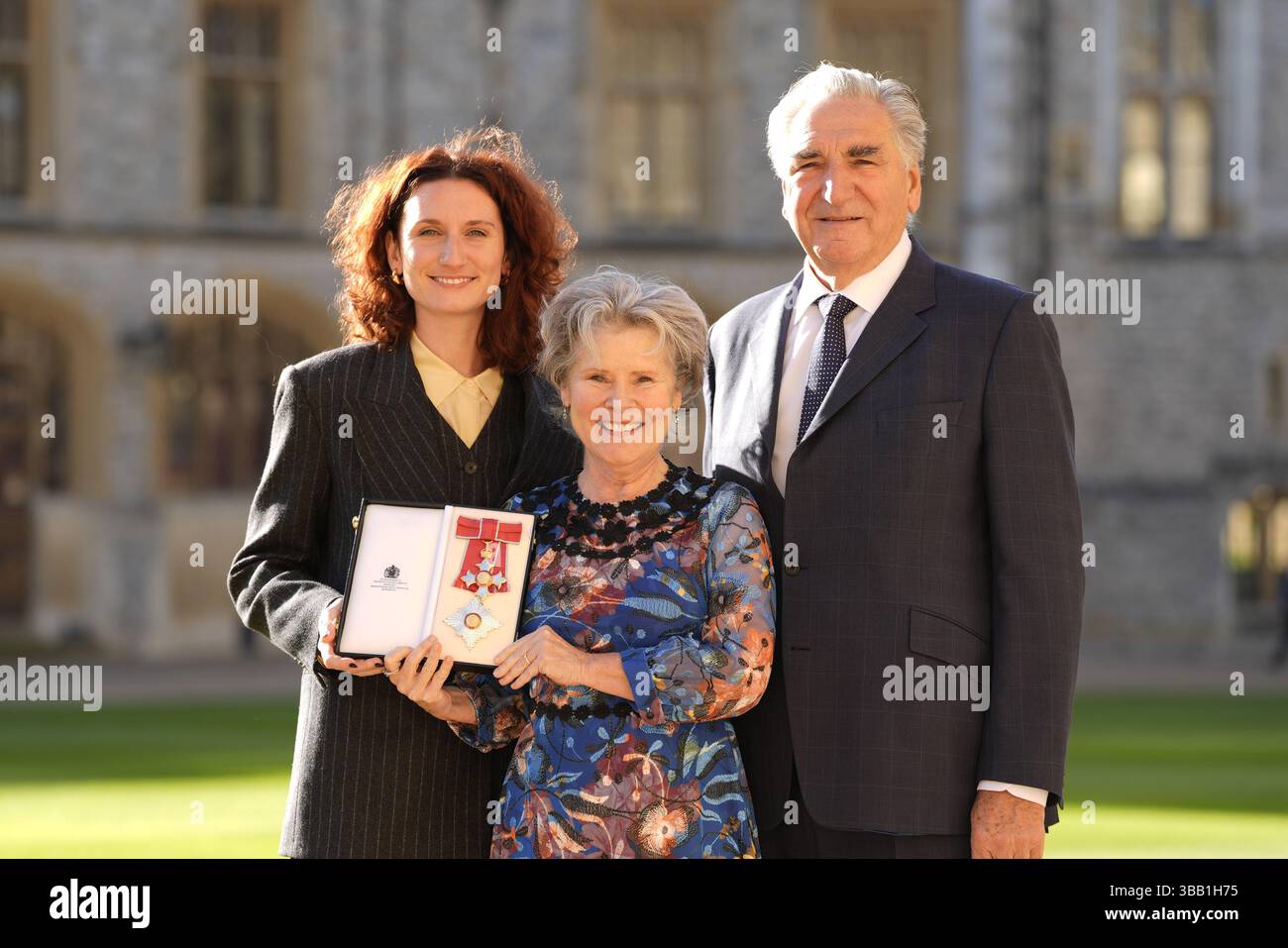 Dame Imelda Staunton (centre) with her husband Jim Carter and daughter ...