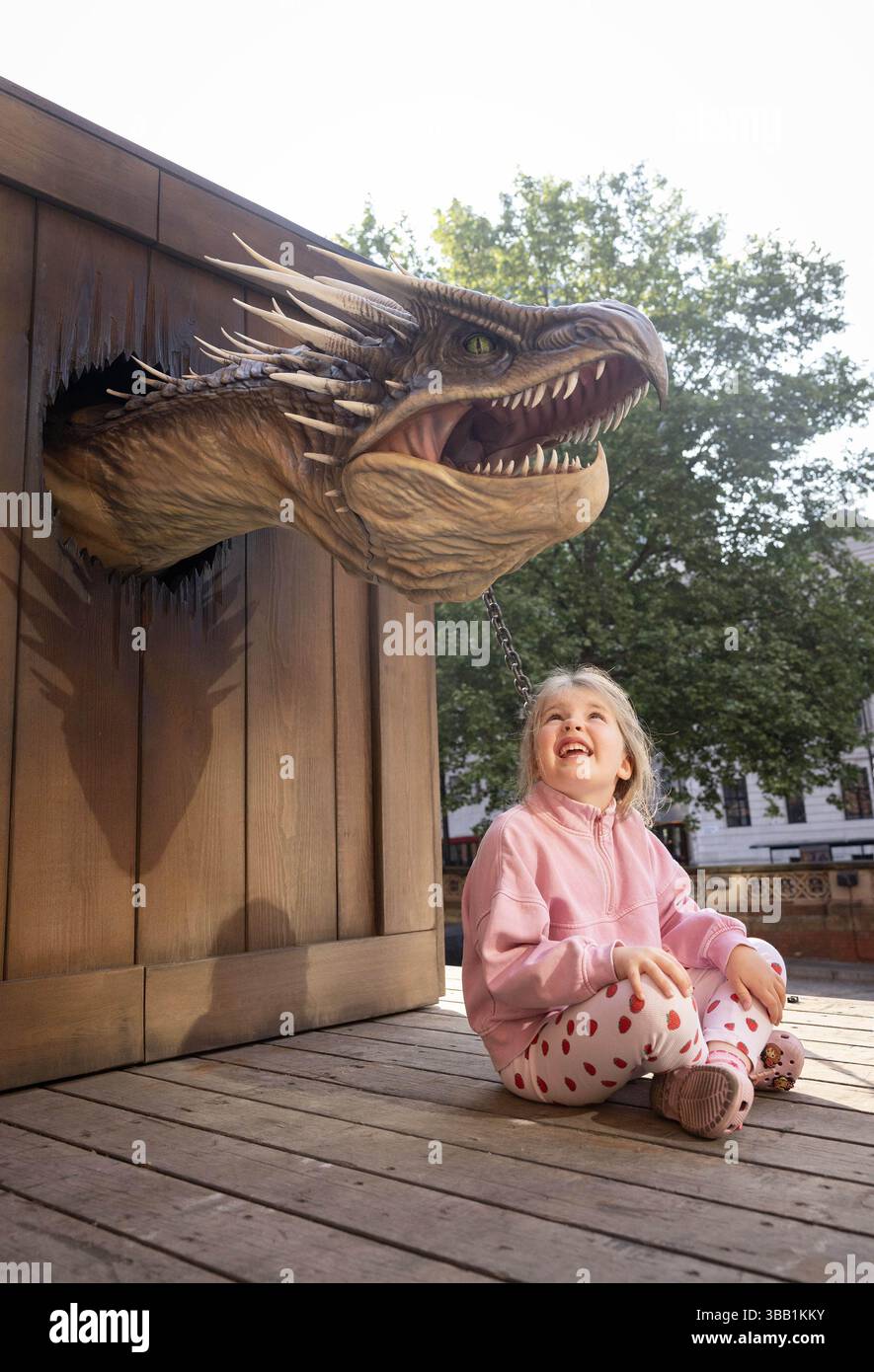 EDITORIAL USE ONLY Rae McFarlane, age 5, reacts to a 25-ft-long ...