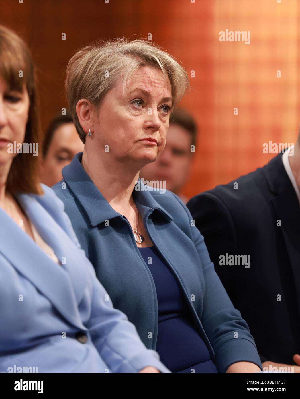 Home Secretary Yvette Cooper listens to the Prime Minister during a ...