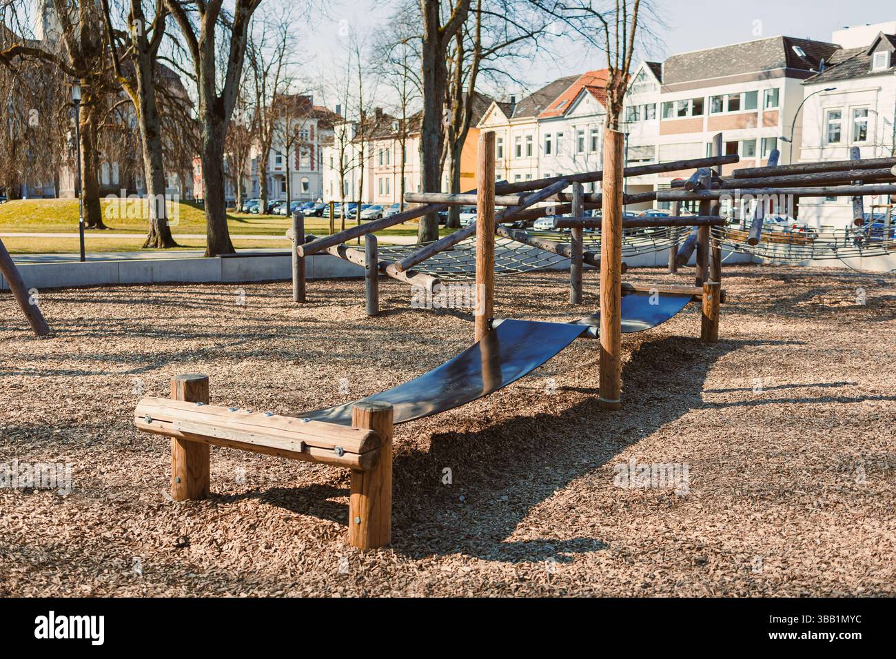 Urban playground with a slide in the open air. Wooden playground Stock ...