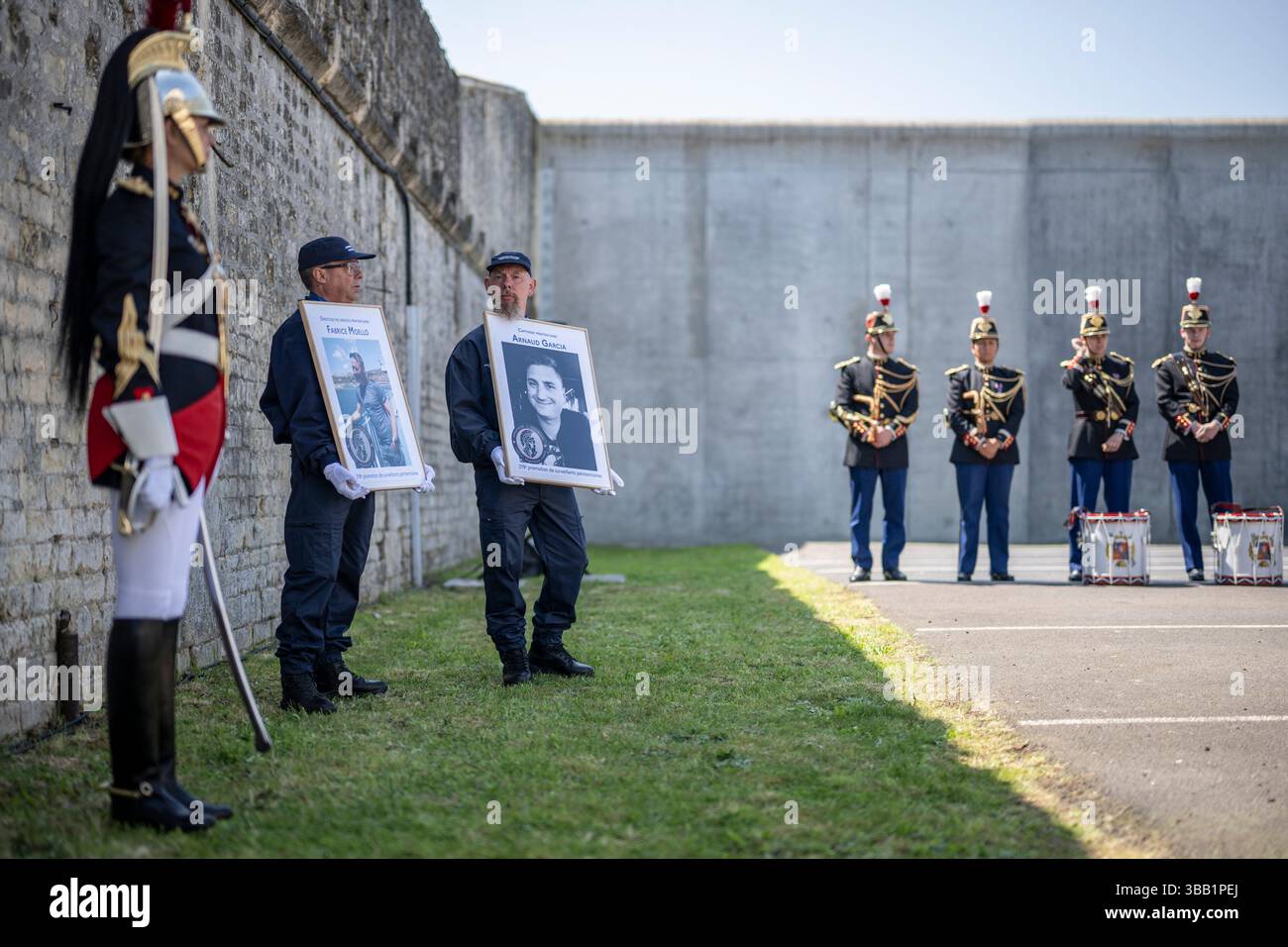 Caen, France. 14th May, 2025. French prison officers, hold portraits of ...