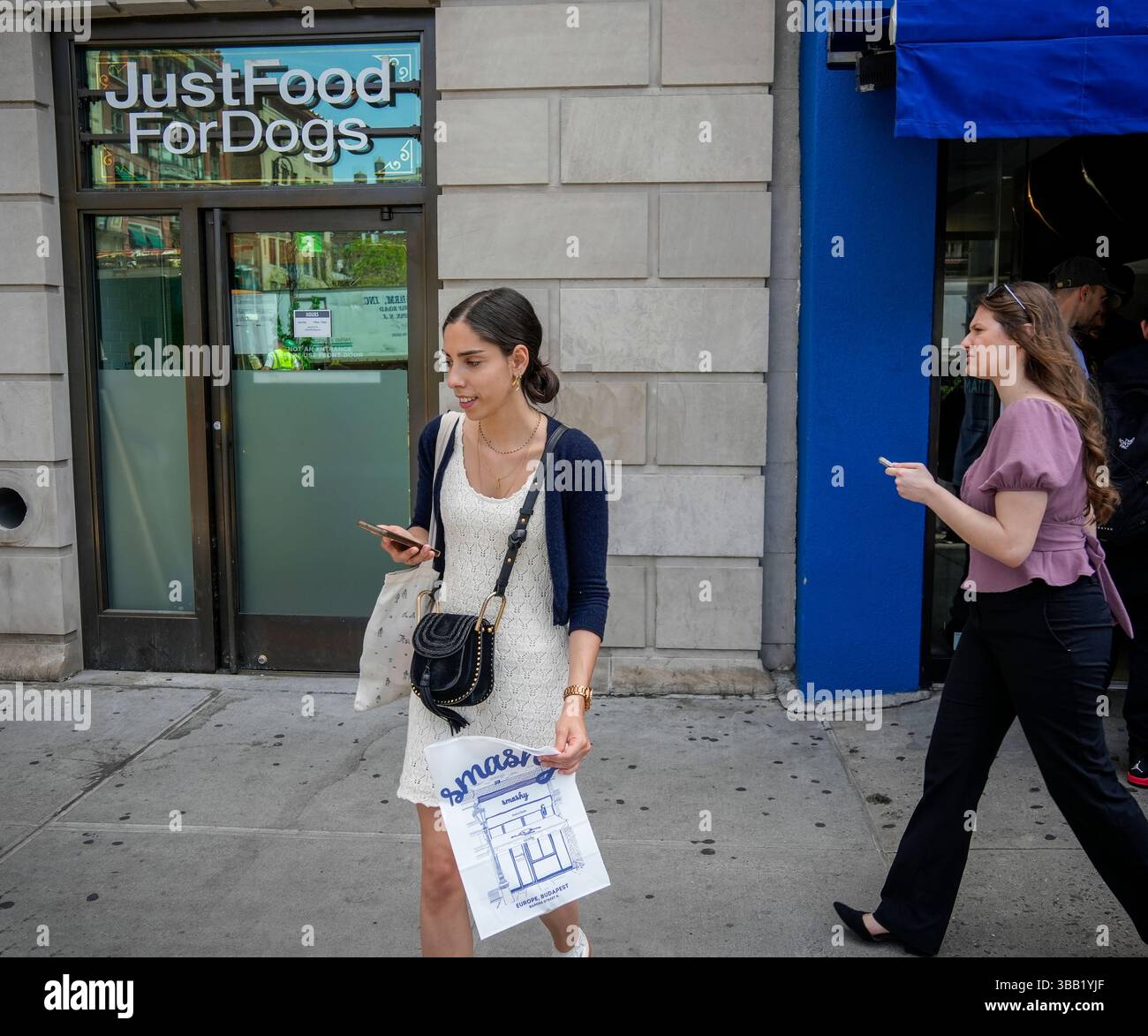 Throngs of people show up at the grand opening of Smashy, a burger ...