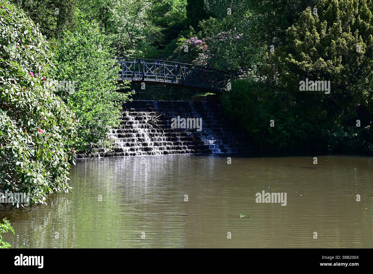 Stepped weir splashing into a lake Stock Photo - Alamy