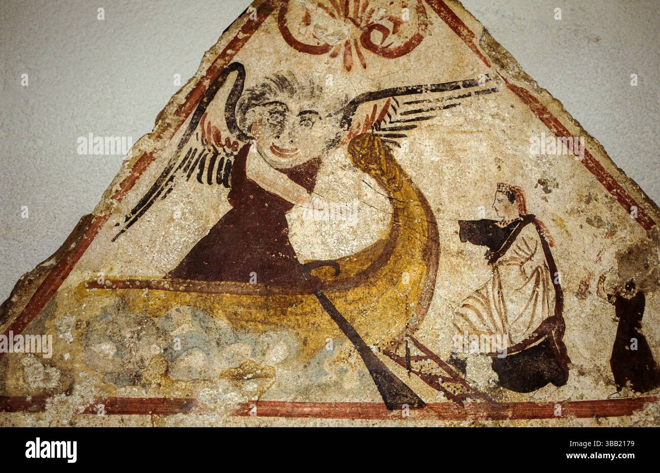 A smiling winged Charon, ferryman of souls, welcomes a dead woman as ...