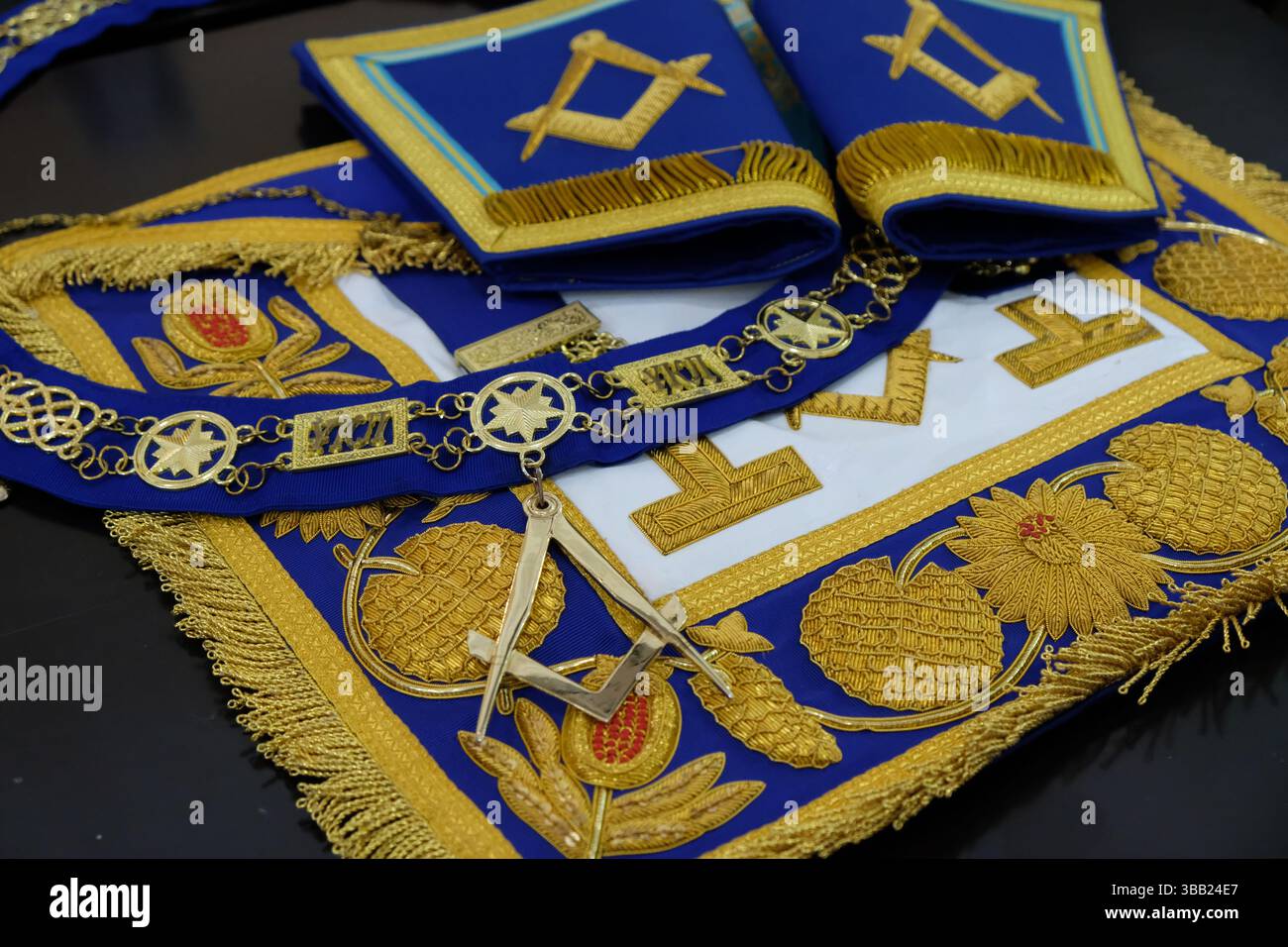 Various symbols of the Masonry are laid out on the table Stock Photo ...