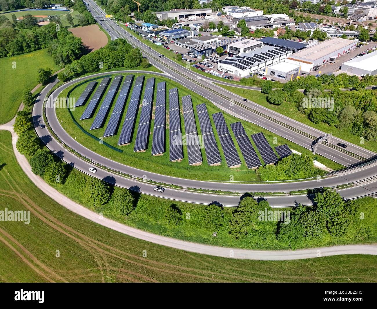 Aerial drone photo of large array of photovoltaic solar panels next to ...