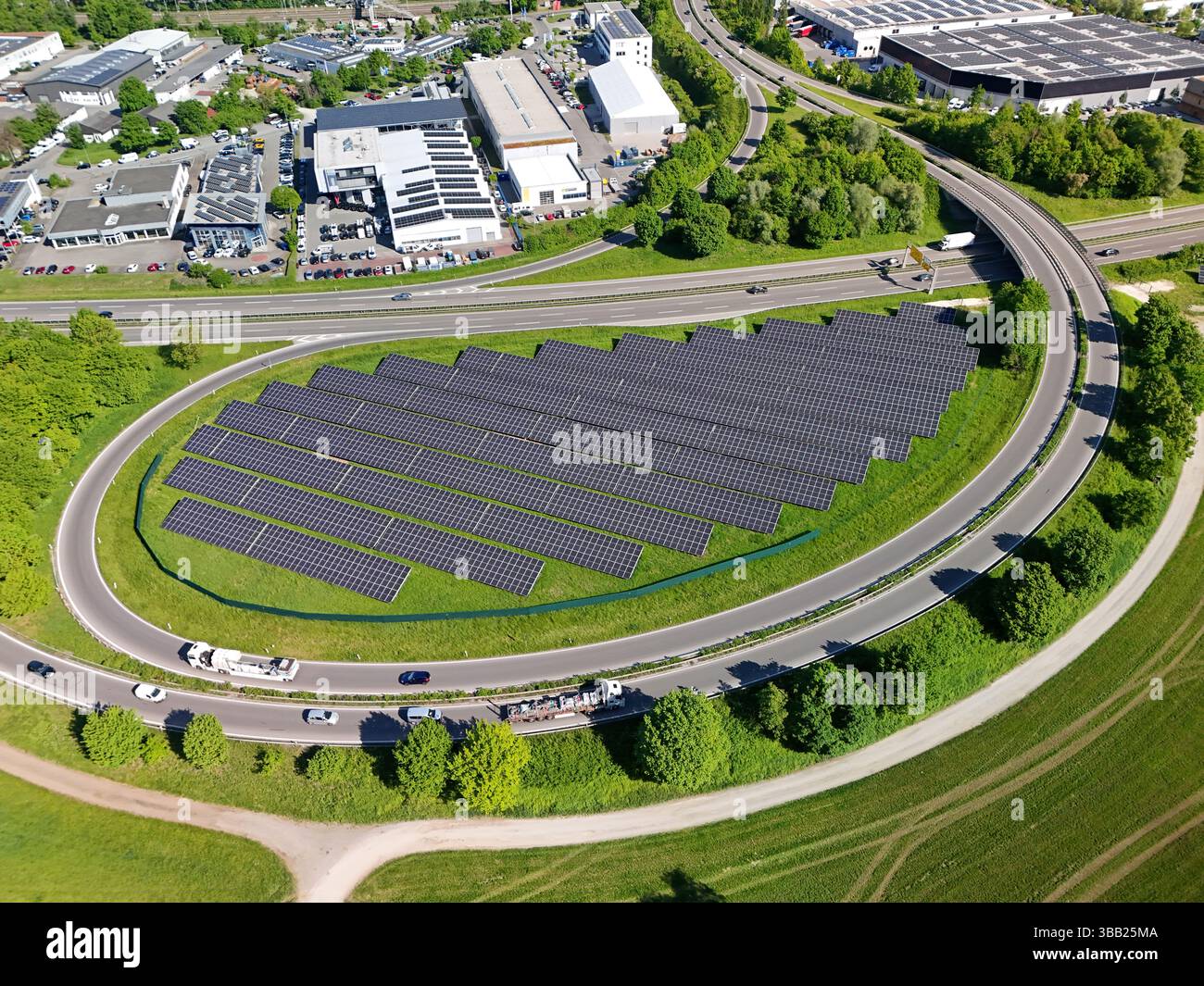 Aerial drone photo of photovoltaic solar panels next to a motorway ...