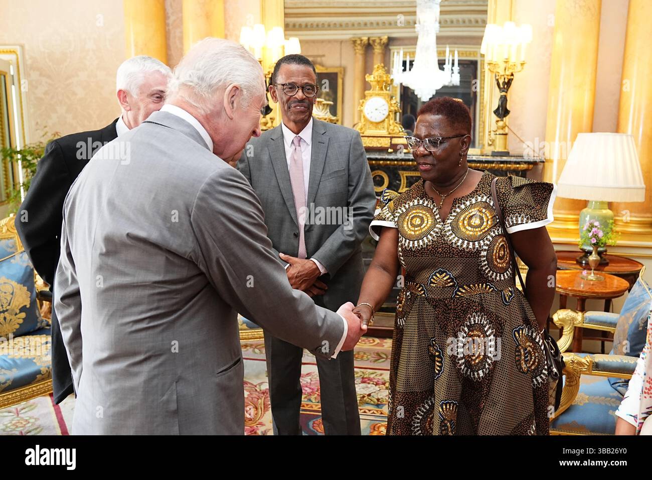 King Charles III holds an audience with Hon. Dennis P. Lister J.P., MP ...