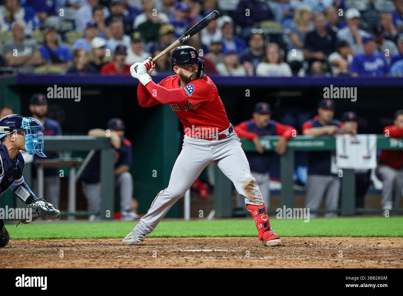 Kansas City, MO, USA. 9th May, 2025. Boston Red Sox catcher Connor Wong (12) bats against the ...
