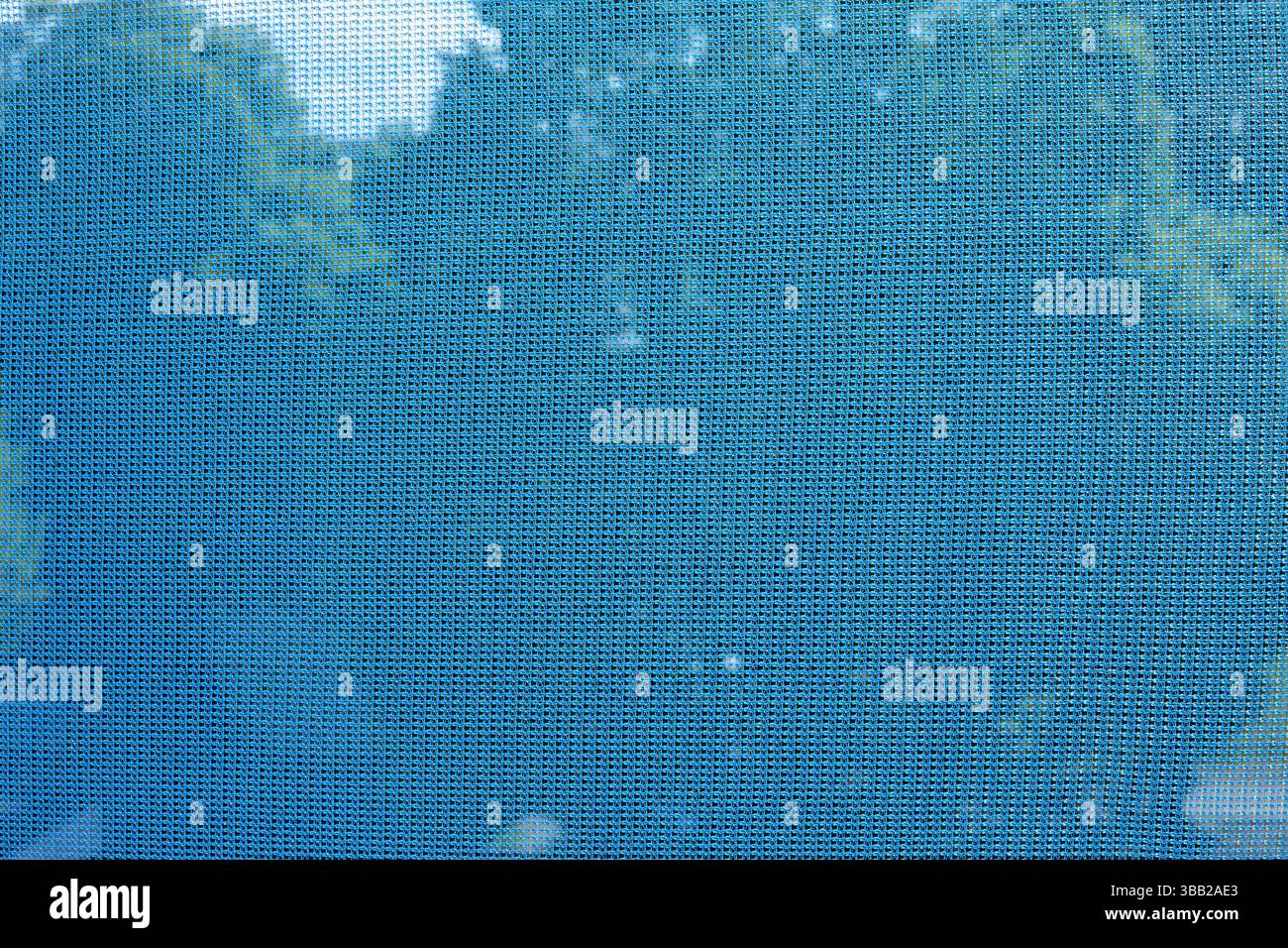 Scaffolding netting or scaffold mesh on building facade scaffolding ...