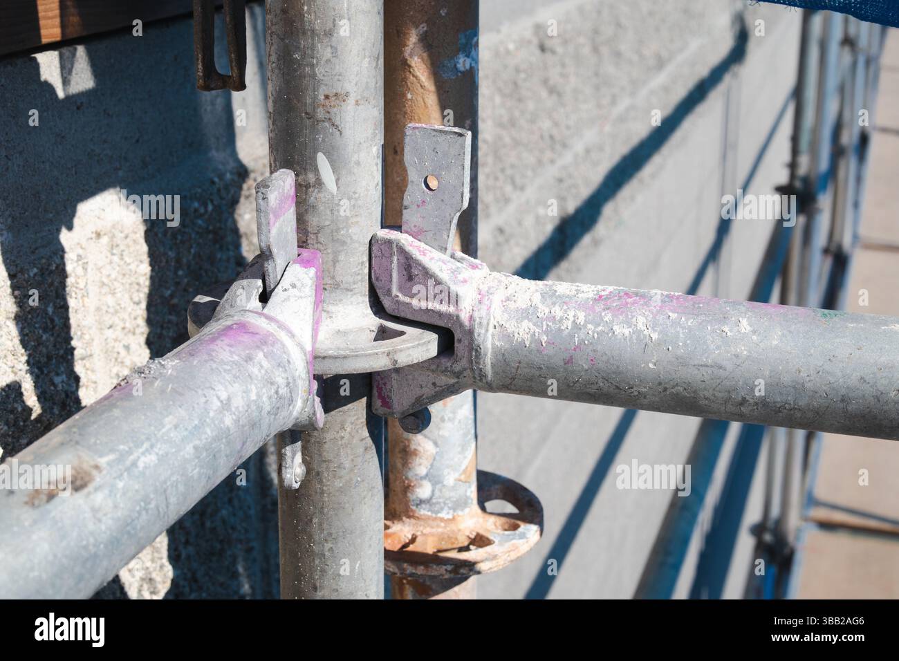 Ringlock scaffolding system. Close up corner with of ledger connected ...