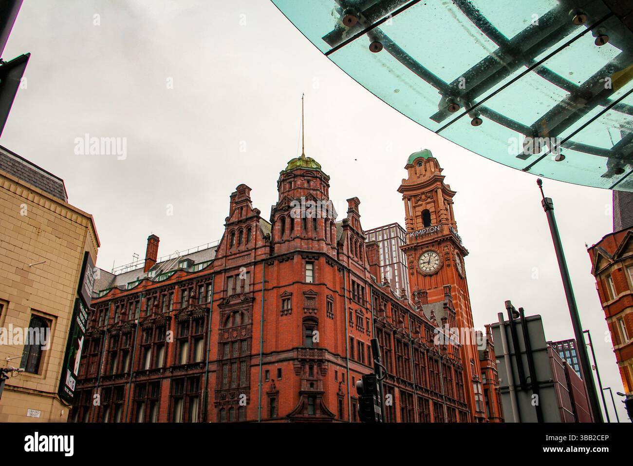 Ornate red-brick gothic building with turrets and carvings, an iconic ...