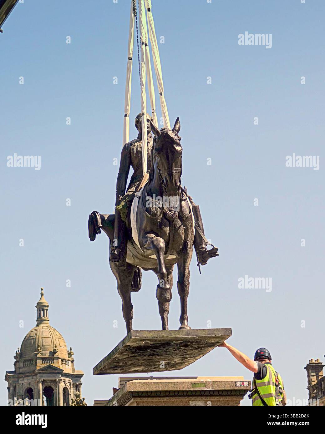 Glasgow, Scotland, UK. 14th May, 2025. Prince albert statue hoisted ...