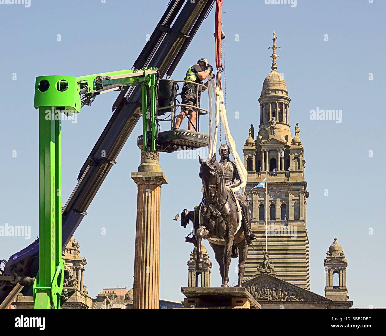 Glasgow, Scotland, UK. 14th May, 2025. Prince albert statue hoisted ...