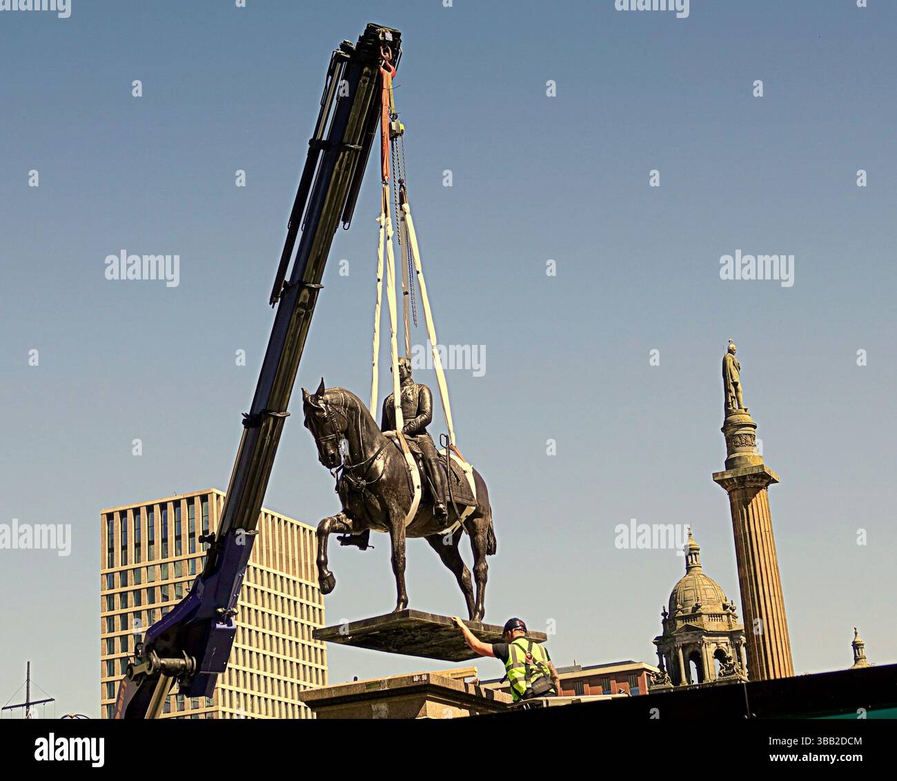 Glasgow, Scotland, UK. 14th May, 2025. Prince albert statue hoisted ...