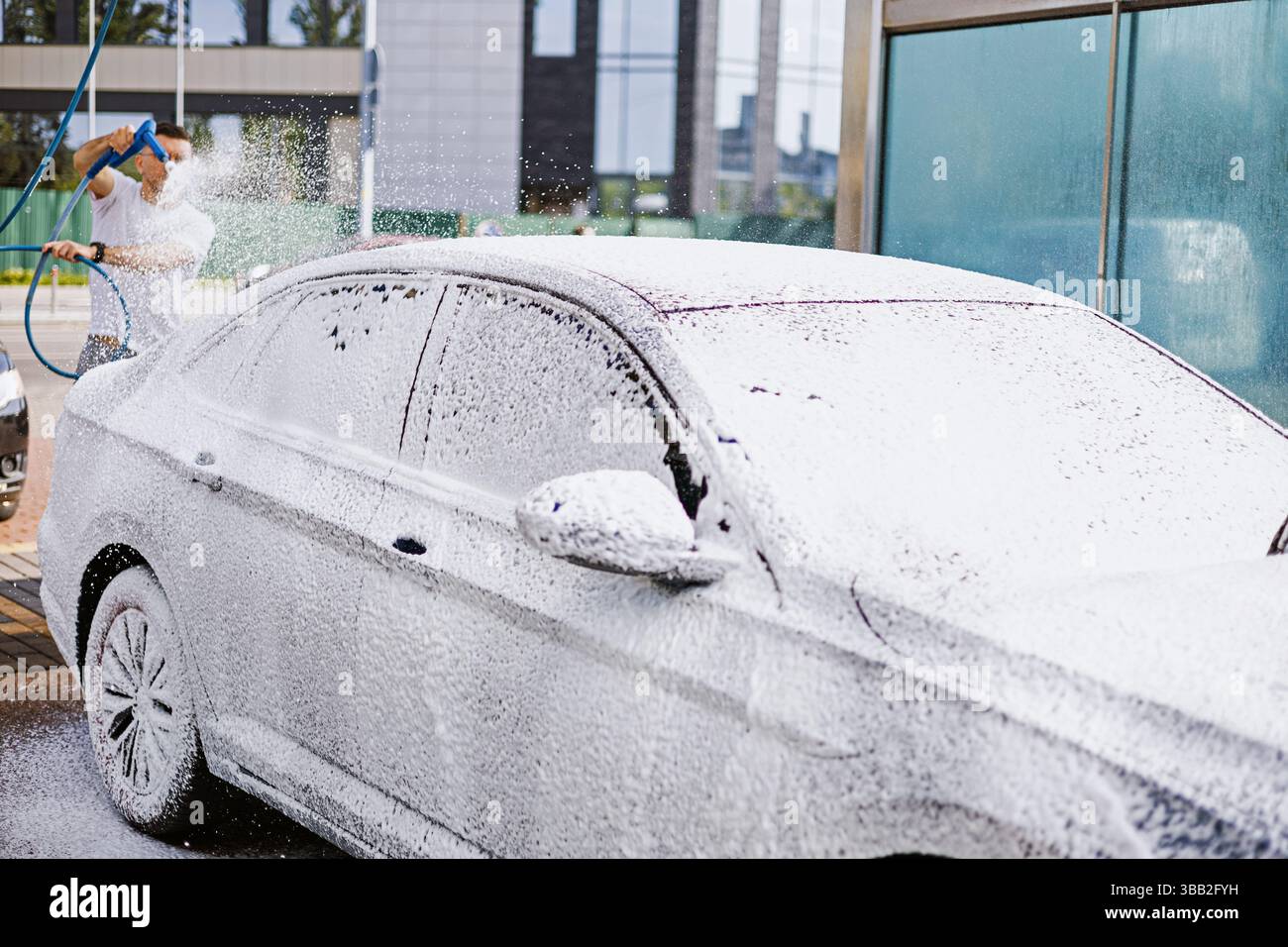 Man washing car carwash high hi-res stock photography and images - Alamy