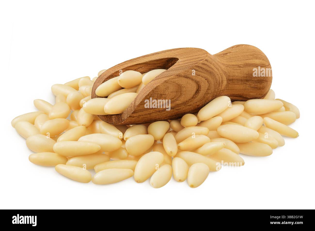 Shelled European pine nuts in wooden scoop isolated on white background ...