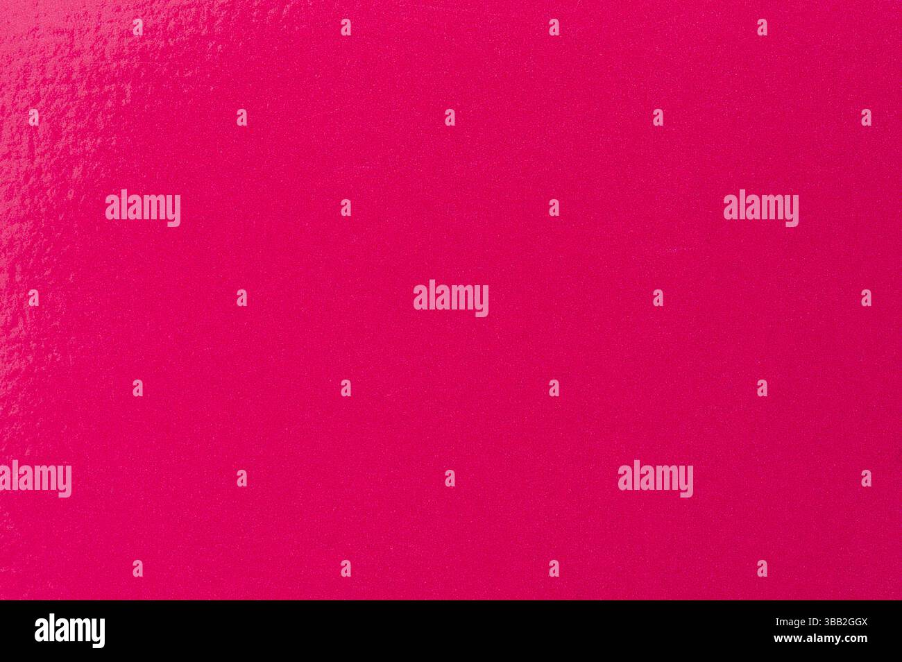 Smooth and glossy bright pink surface reflects light, providing ...
