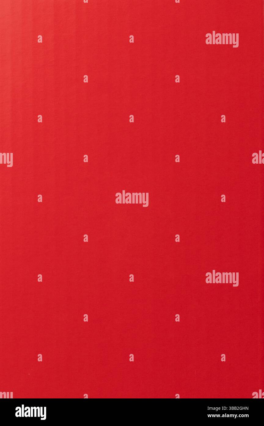 Vivid red backdrop features smooth texture, perfect for creative ...
