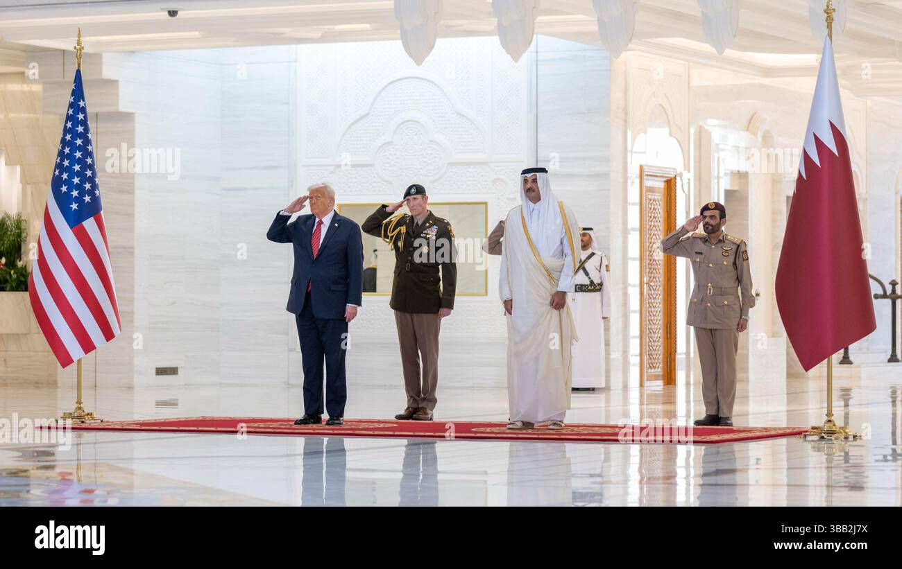 Doha, Qatar. 14th May, 2025. U.S. President Donald Trump (L) salutes as ...