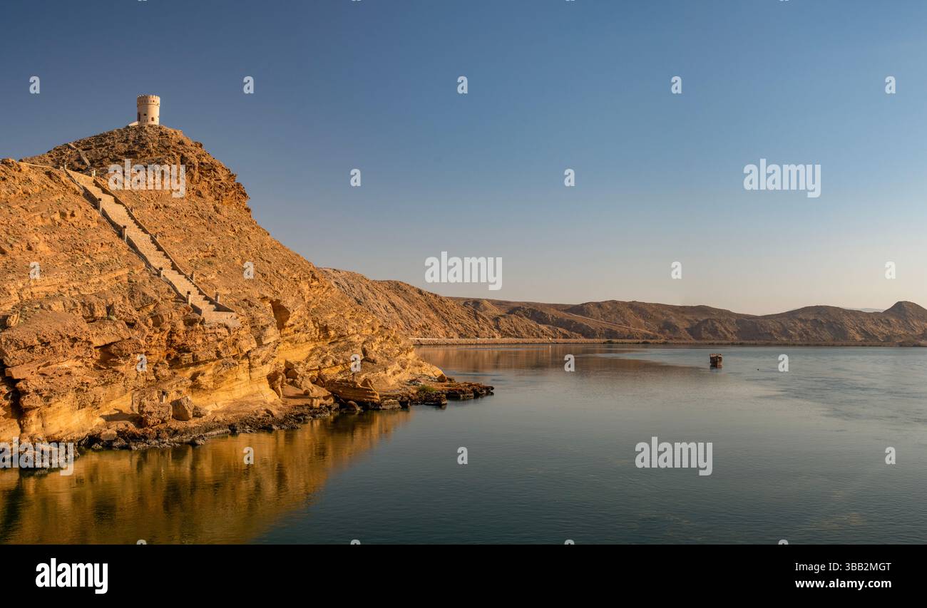 Oman, Middle East: the fjord and the Al Ayjah Watchtower of the town of ...