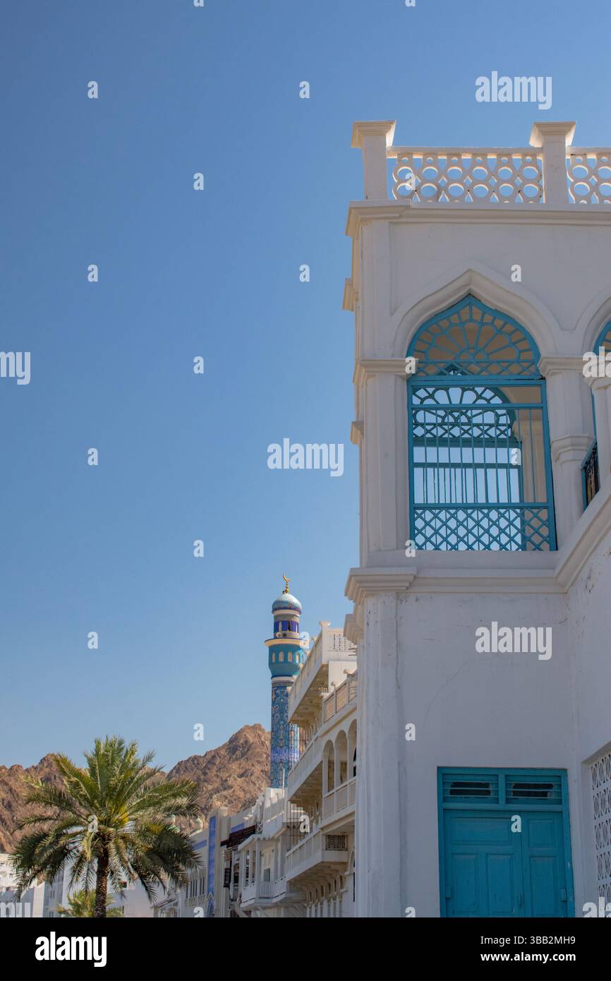 Oman: white house with blue windows on Mutrah Corniche and the famous ...
