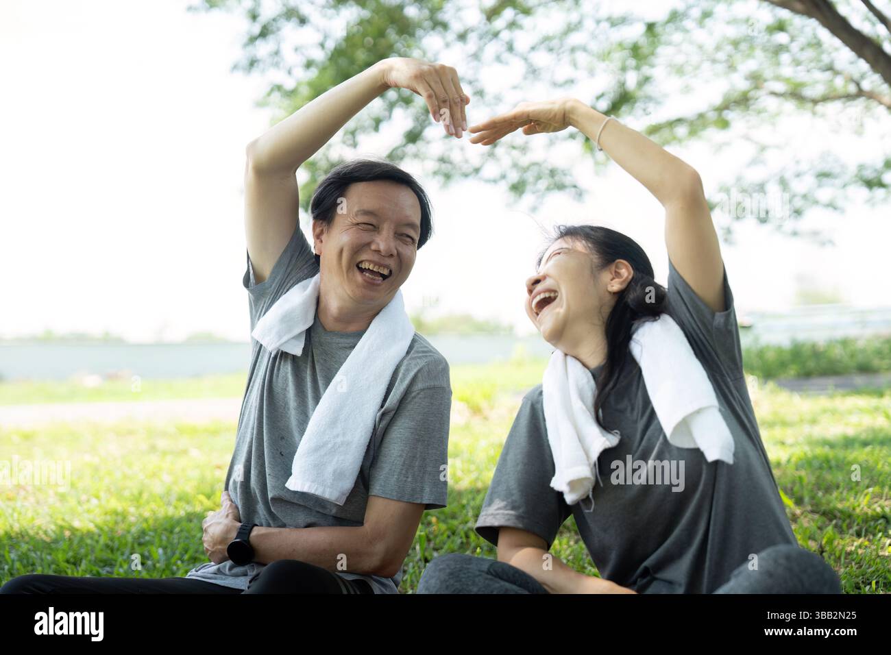 Wellness and yoga joy captured in playful seniors couple moment Stock ...