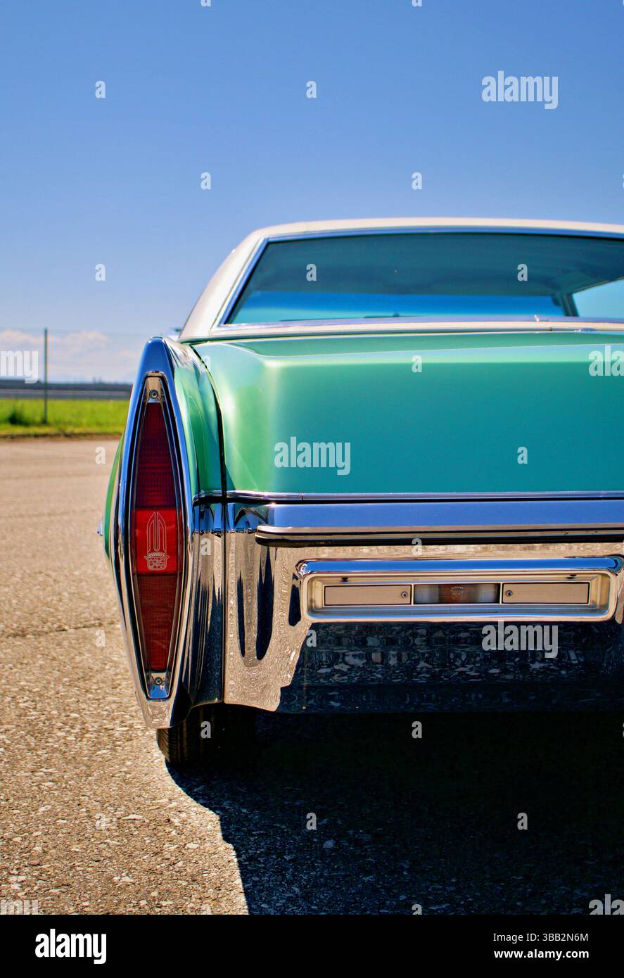 Vintage Cadillac Rear Detail with Chrome and Green Finish Stock Photo ...