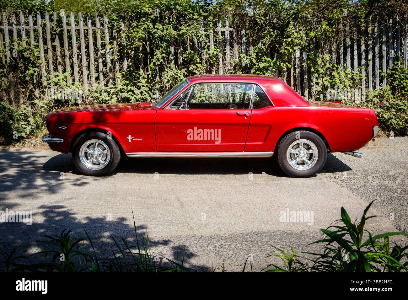 side view of vintage 1960s red ford mustang car vehicle at North East ...