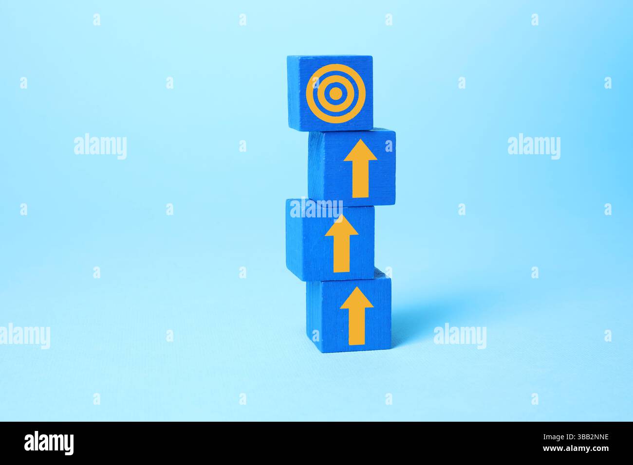 Targeting. Stacked cubes with arrows pointing at bullseye on top cube ...