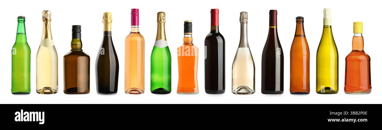 Bottles with different types of alcoholic drinks isolated on white, set ...