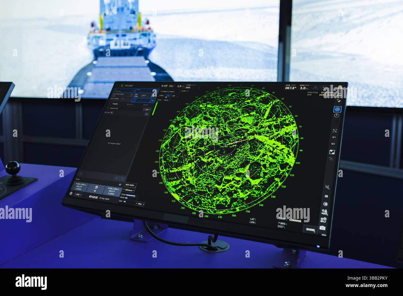 Ships radar system on its bridge showing an active display used for ...