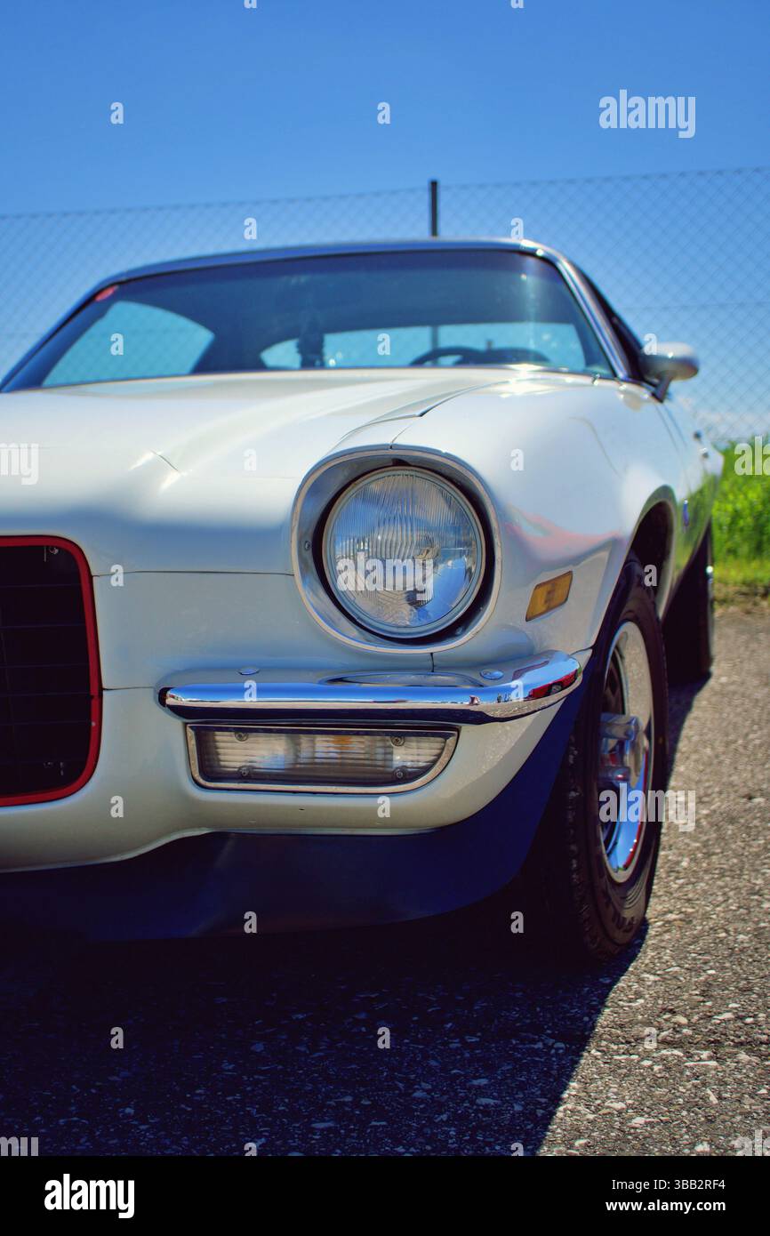 Classic White Chevrolet Camaro Front View with Chrome Bumper and Round ...