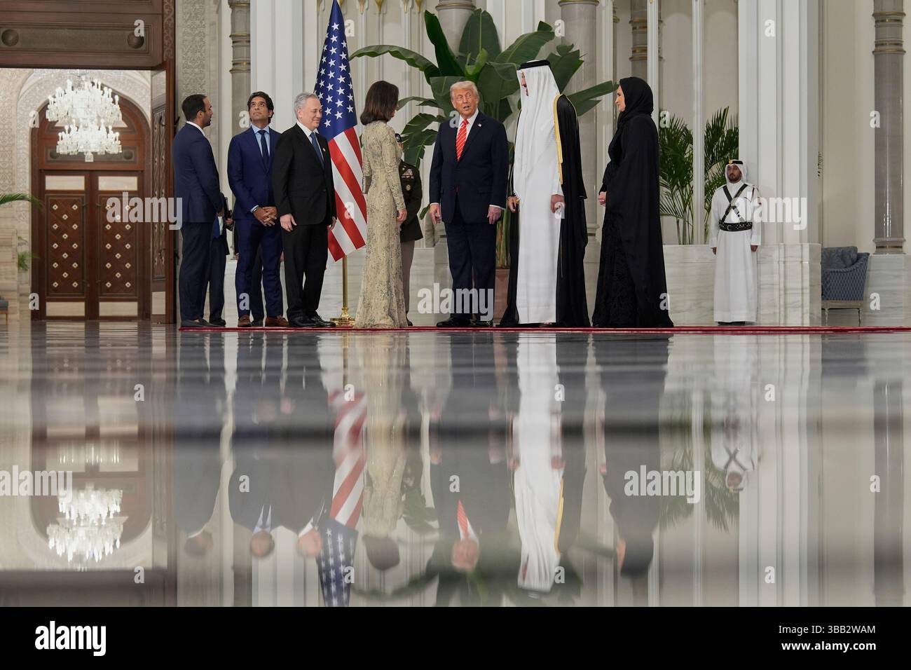 President Donald Trump speaks with Qatar's Emir Sheikh Tamim bin Hamad Al Thani prior a state ...