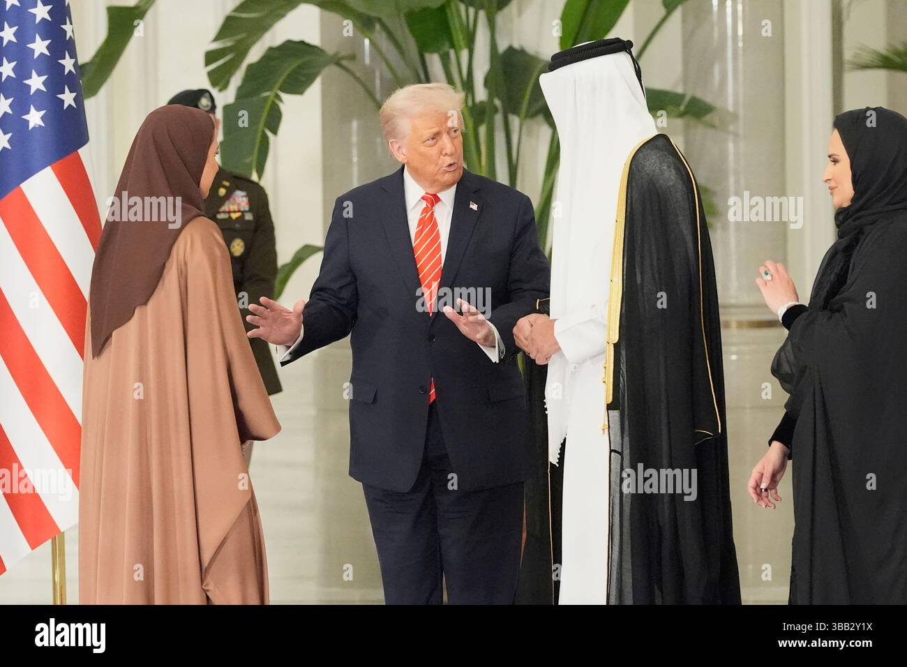 President Donald Trump greets Qatari delegations with Qatar's Emir ...