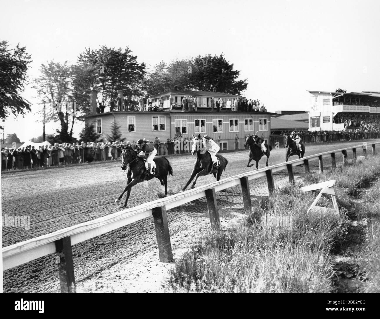 FILE - Citation, running easily, leads the Preakness field around the ...