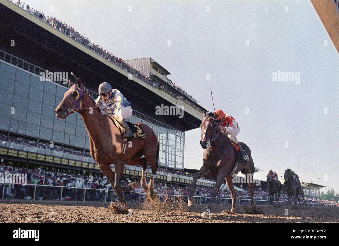 FILE - Alysheba, with Chris McCarron up, leads Bet Twice, right, at the ...