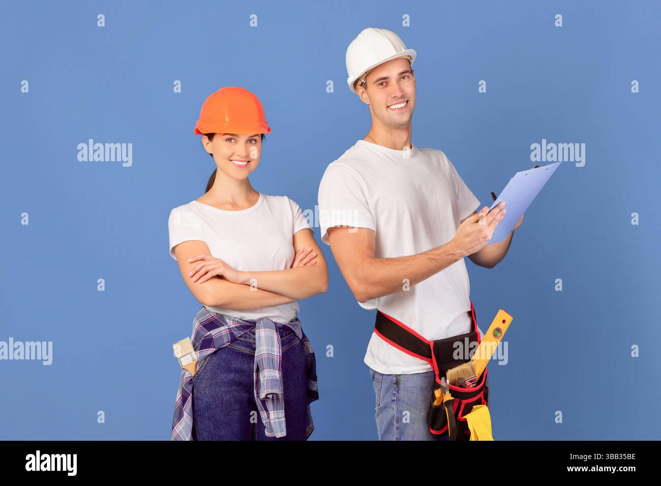 Repairment Budget Planning. Portrait Of Man And Woman Repair Masters In ...