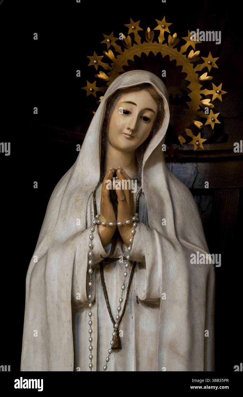 Colunga, Spain - 04-28-2025: Statue (19th century) of Virgin Mary ...