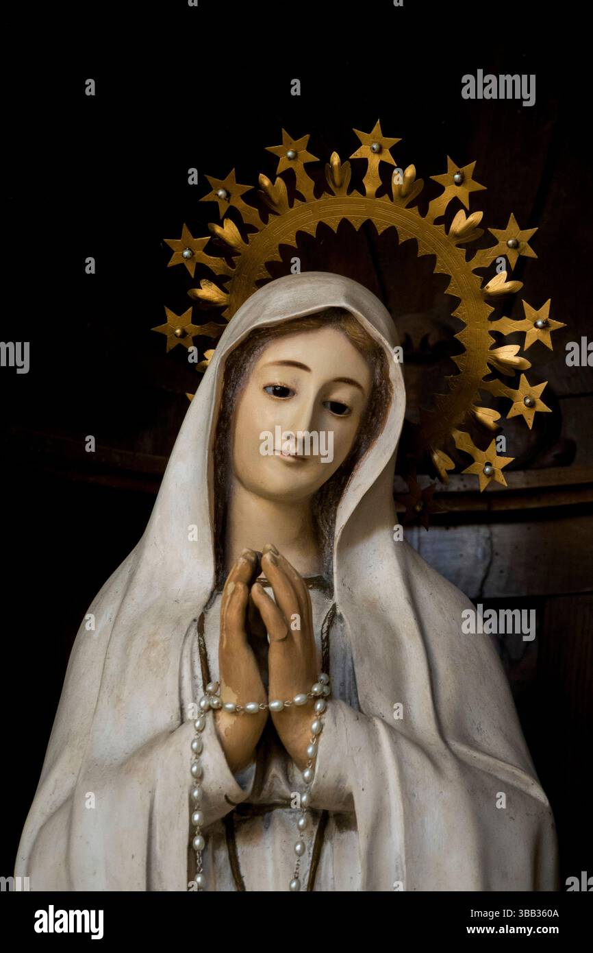 Colunga, Spain - 04-28-2025: Statue (19th century) of Virgin Mary ...