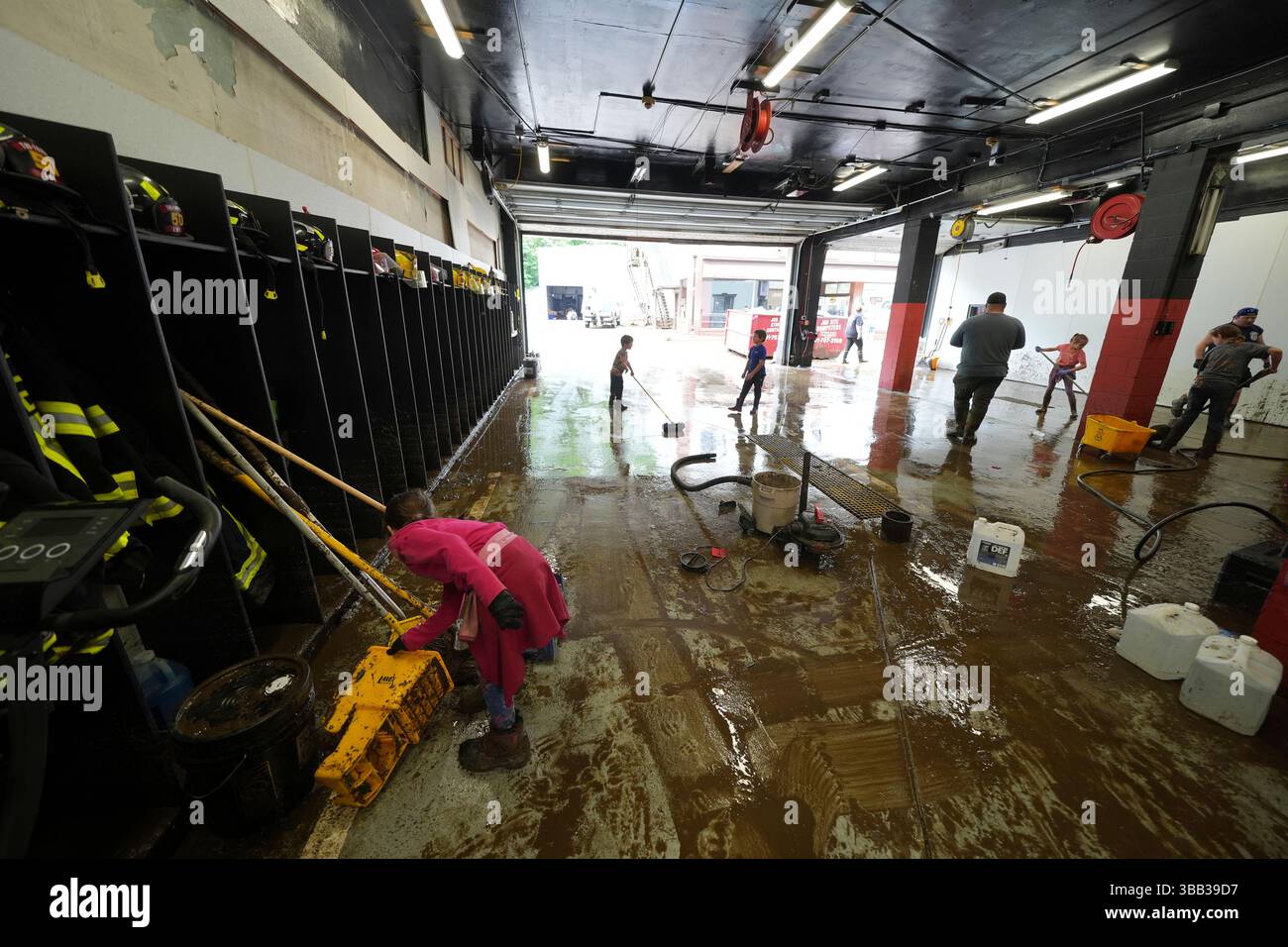Clean up continues inside the fire station after flooding on Wednesday ...